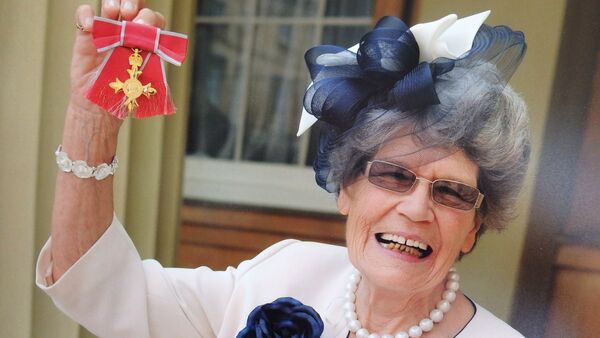 Maud Kells presented with OBE / WEC UK