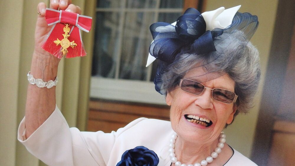 Maud Kells presented with OBE / WEC UK